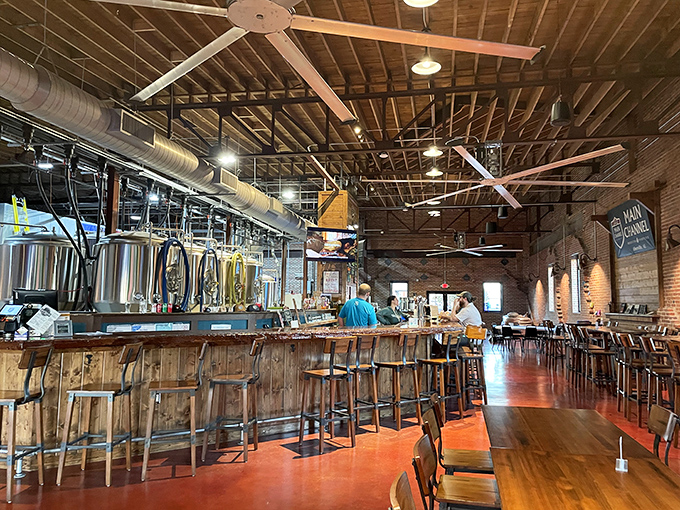 Main Channel Brewing combines rustic charm with craft beer innovation. Exposed brick and ceiling beams that have seen more stories than a librarian.