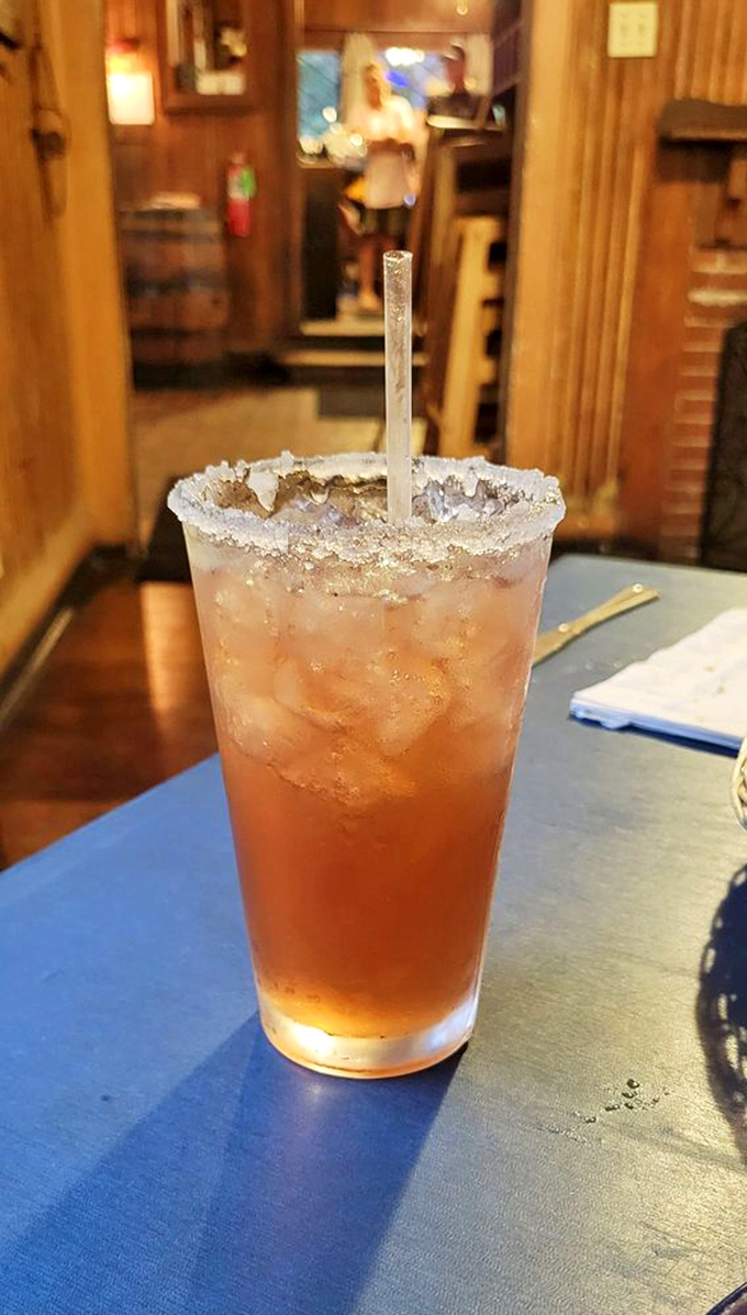 A salt-rimmed glass of sunset-colored refreshment&mdash;because seafood this good deserves a proper toast.