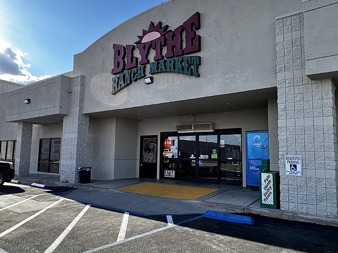 The Blythe Realty Market sign stands as a beacon for those seeking affordable desert dreams&mdash;where your dollar stretches further than your urban imagination.