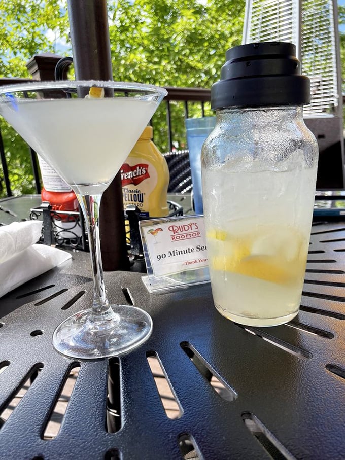 The famous Rudytini sits elegantly alongside a shaker promising refills&mdash;because one perfect martini is never enough when the conversation's flowing.