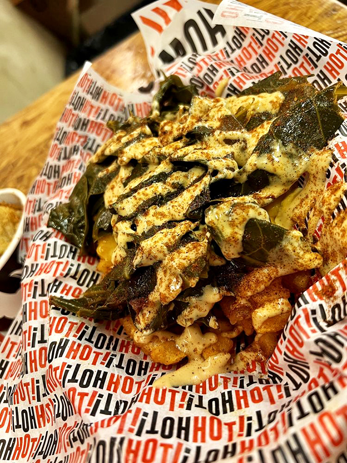 Loaded fries that refuse to be a mere side dish. Topped with spices and sauce, they're demanding equal billing with the main attraction.