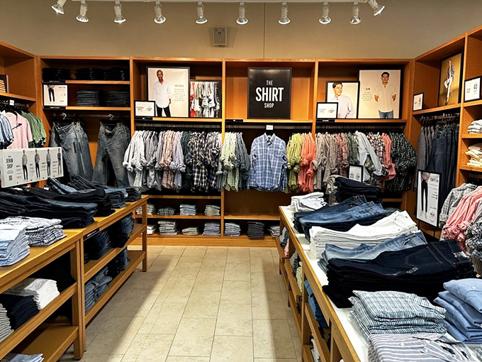 Men's shirts displayed with military precision, creating the illusion that organization in your closet at home is actually achievable.