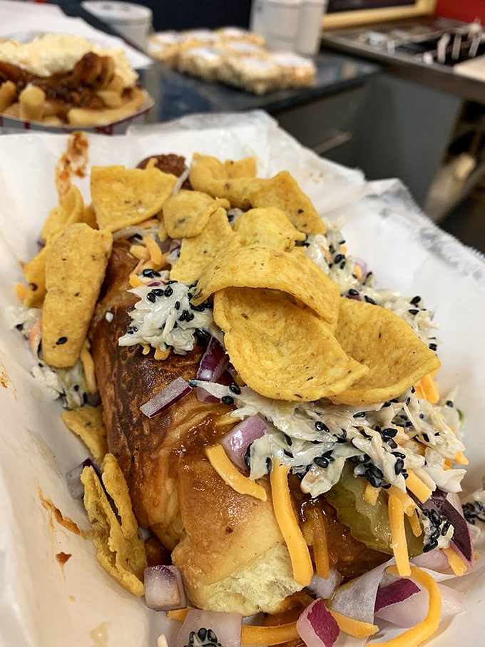 A hot dog dressed in slaw and chips isn't just lunch&mdash;it's a textural symphony where each crunchy bite plays harmony to the savory base notes.