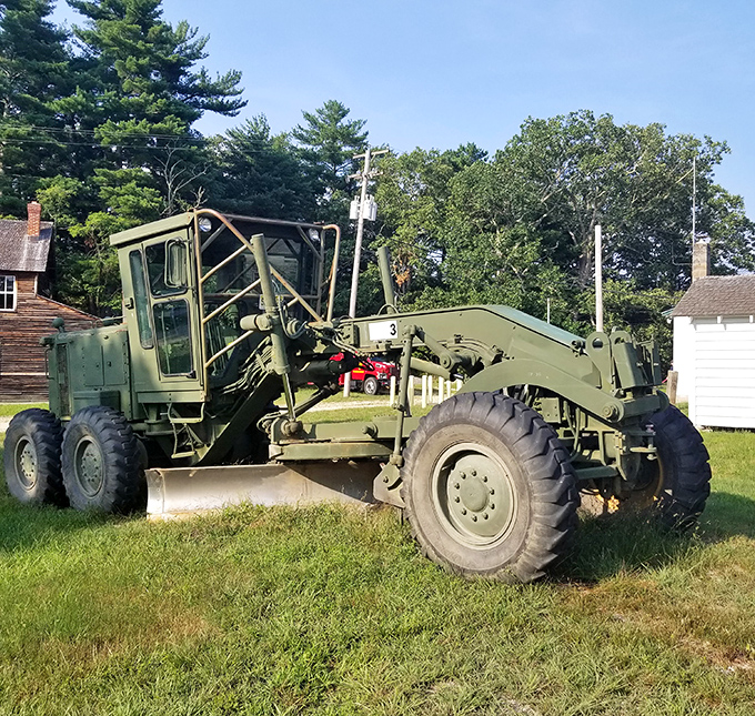 This vintage road grader stands as a mechanical monument to the park's working past, when "heavy equipment" wasn't just your holiday luggage.