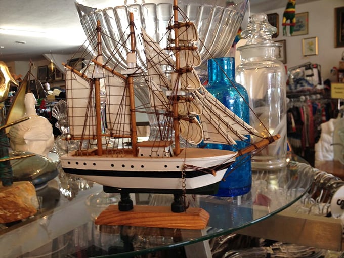 A miniature ship sails eternally on a glass sea, waiting for someone to rescue it from retail purgatory.