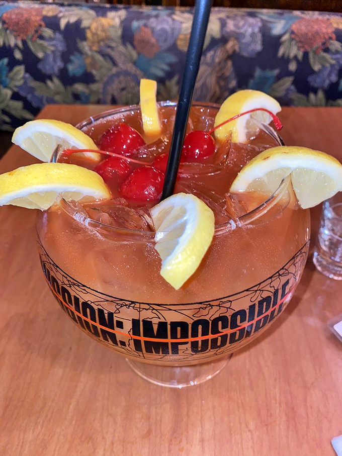 The Mission Impossible cocktail arrives with enough garnish to disguise its potency. Those cherries and lemon slices are just a clever distraction.