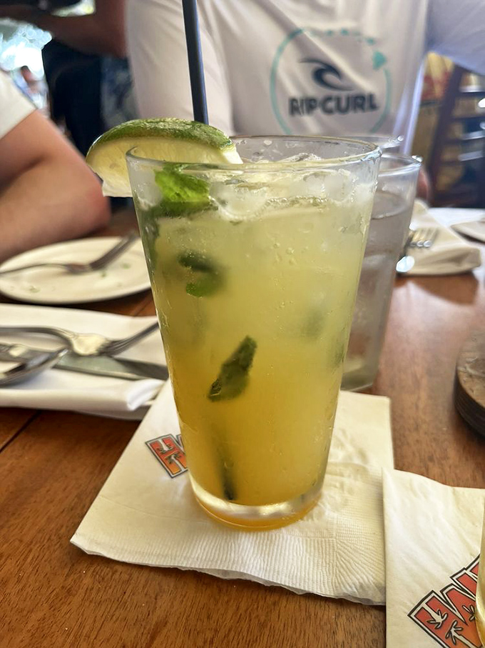The mojito that launched a thousand "I could live here" conversations. Fresh, minty, and somehow tasting exactly like a North Shore afternoon feels.