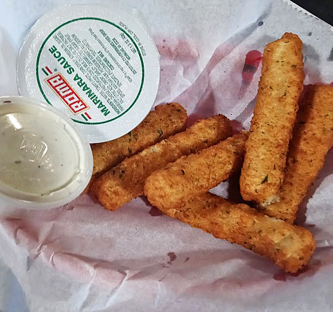 Mozzarella sticks that stretch for days, proving that even the appetizers at Rib Shack are serious business.