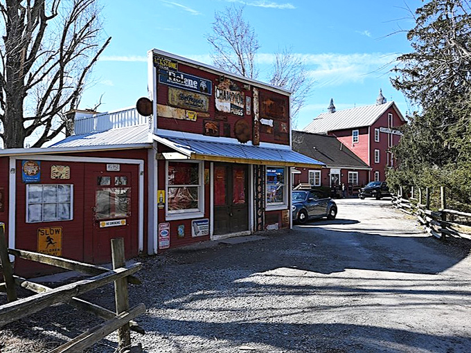 The old gas station wears its vintage advertisements like badges of honor, a roadside time machine pumping nostalgia instead of fuel.