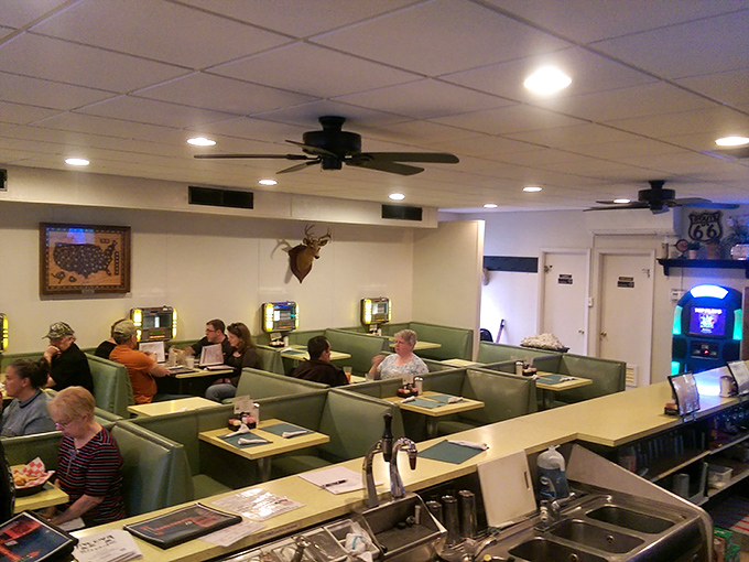 The dining room's mounted deer head watches over patrons like a woodland guardian of good taste and hearty portions.