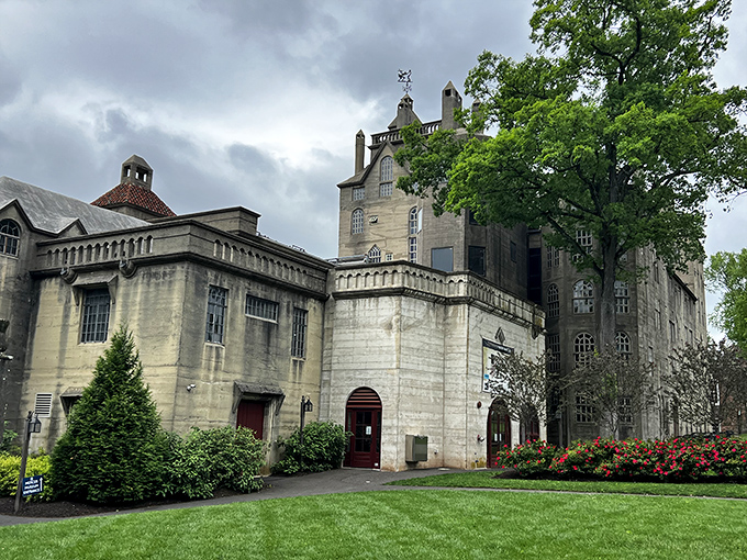 Storybook castle by day, enchanted vision by night. The museum's grounds complement its fairy-tale architecture with manicured lawns and thoughtful landscaping.