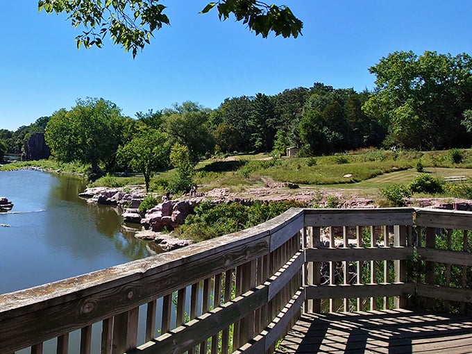 Nature's balcony! This viewing platform offers front-row seats to the greatest show on earth: quartzite cliffs meeting prairie sky and flowing water.