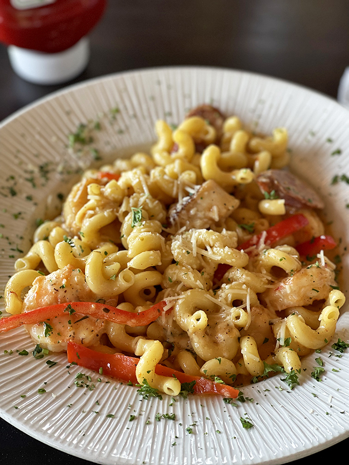 Pasta that doesn't just sit on the plate&mdash;it performs. Those shrimp and peppers aren't ingredients; they're co-stars in this comfort food production.