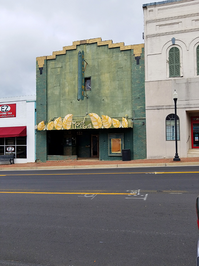 The Pastime Theater's art deco facade whispers of movie nights past, when entertainment didn't require a streaming subscription or complicated password.