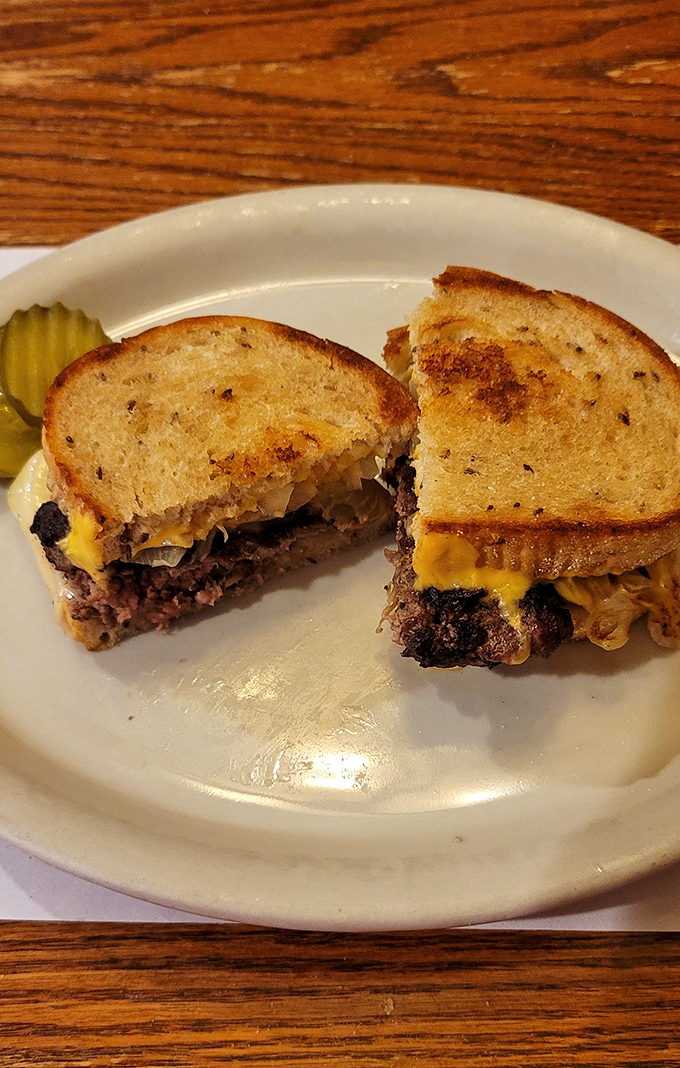 The patty melt: where burger meets grilled cheese in a beautiful union that makes you wonder why they ever lived separate lives.
