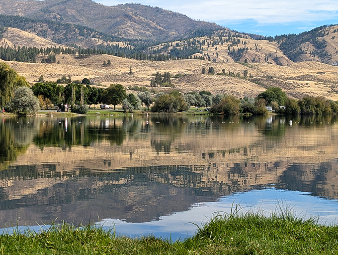 Pearrygin Lake mirrors the surrounding hills with such perfection that you'll wonder which view deserves your camera's attention first.