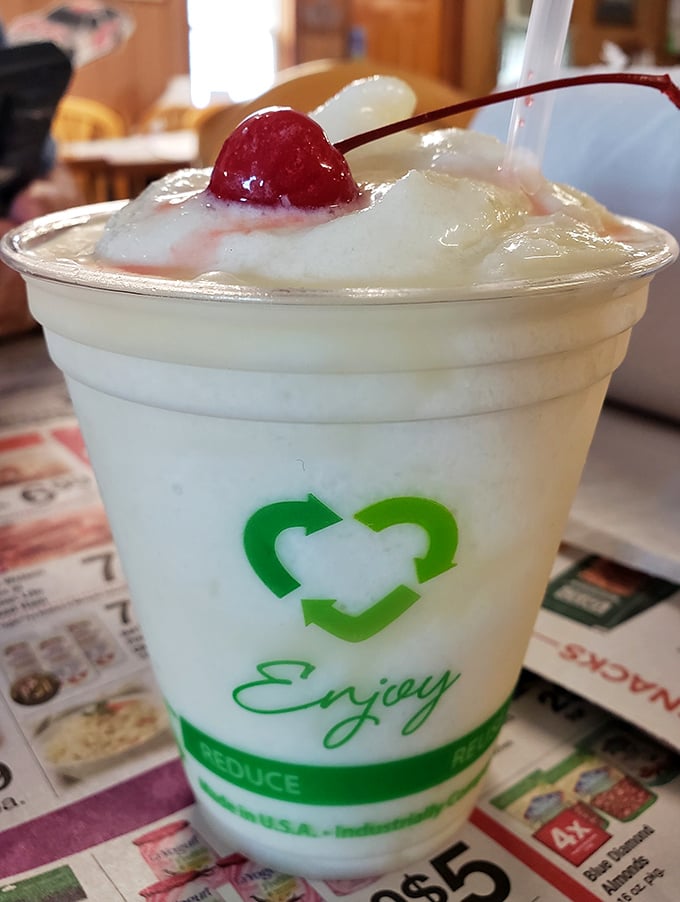 That cherry-topped tropical escape in a cup proves that even serious crab houses understand the importance of dessert beverage options.