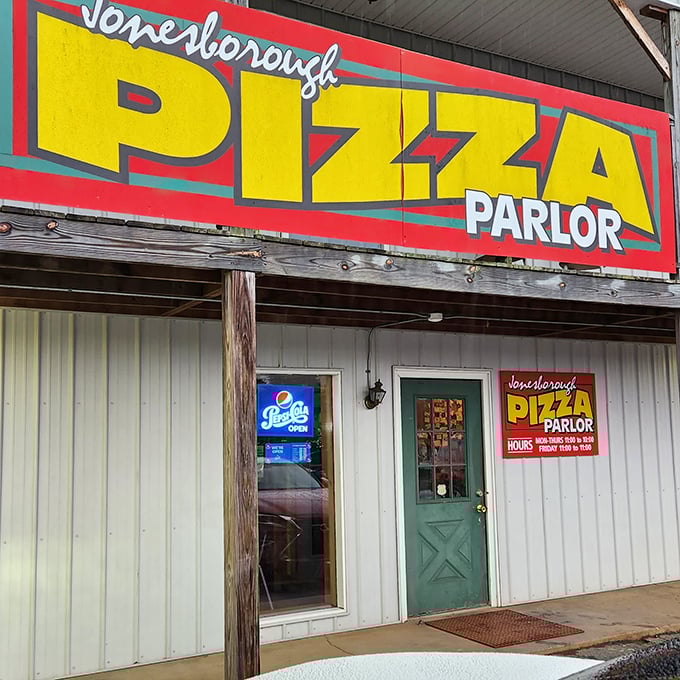 Jonesborough Pizza Parlor's sign promises no-frills deliciousness. In a world of artisanal everything, sometimes you just need an honest slice.