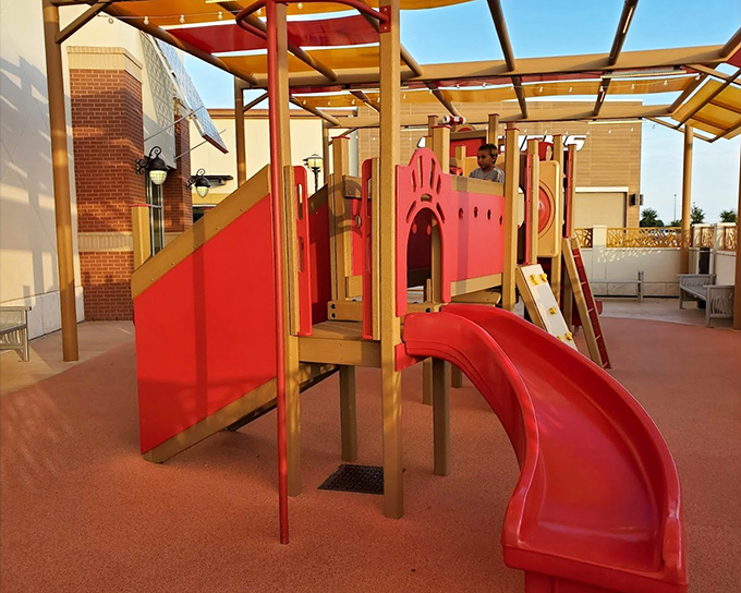 Kid-tested, parent-approved playground offers a tactical shopping break. Where children burn energy while adults contemplate burning credit cards.