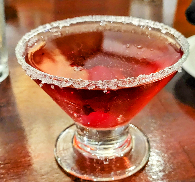 A proper cocktail with a sugar rim that sparkles like jewelry. Because every great steak deserves an equally impressive liquid companion.