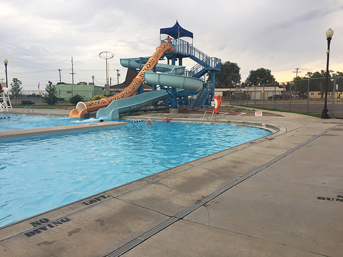 La Junta's public pool features a water slide that promises just enough thrill without requiring a signed waiver. Summer in small-town America, perfectly chlorinated.