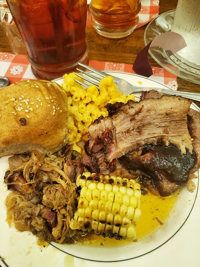 BBQ plate perfection: where pulled pork, mac and cheese, and corn on the cob come together like the supergroup your stomach has been waiting for.