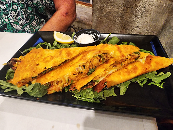 These golden-brown quesadillas aren't just appetizers&mdash;they're crispy envelopes delivering cheesy love letters to your taste buds.