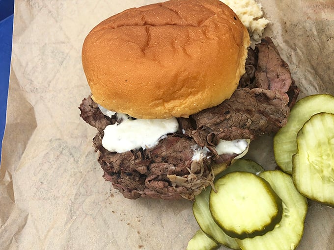 Simplicity at its most sublime. A classic roast beef sandwich with horseradish sauce proves that sometimes the straightforward approach yields the most satisfying results.