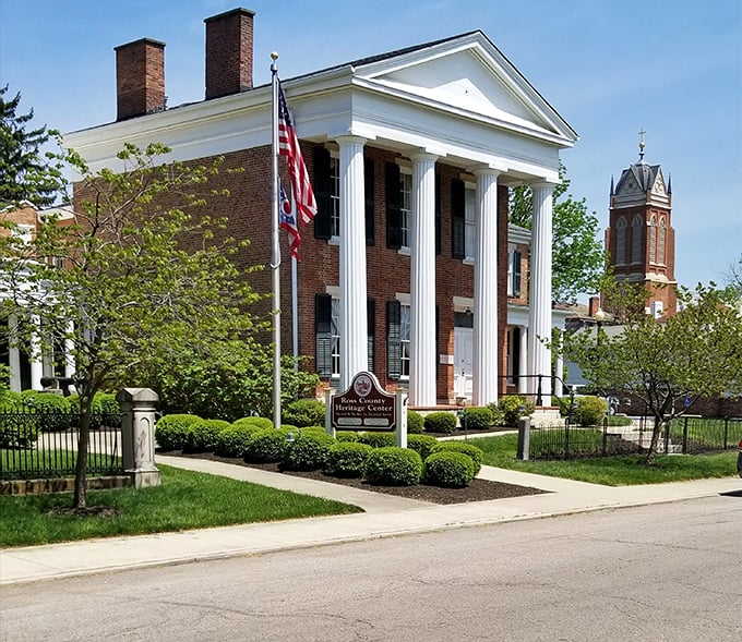 The Ross County Heritage Center stands proudly with its classic columns and brick facade, housing stories that shaped Ohio when "streaming" only referred to nearby creeks.