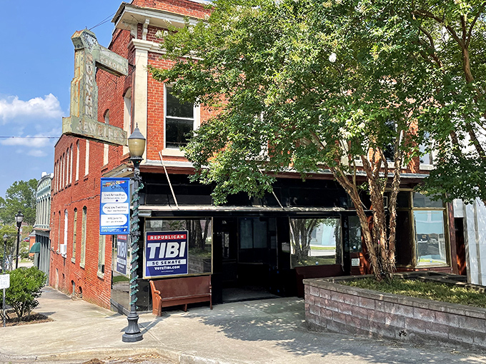 Runyan Jewelers Building: Behind that vintage sign lies a treasure trove of history. The weathered brick facade tells stories that Amazon's "buy now" button never could.