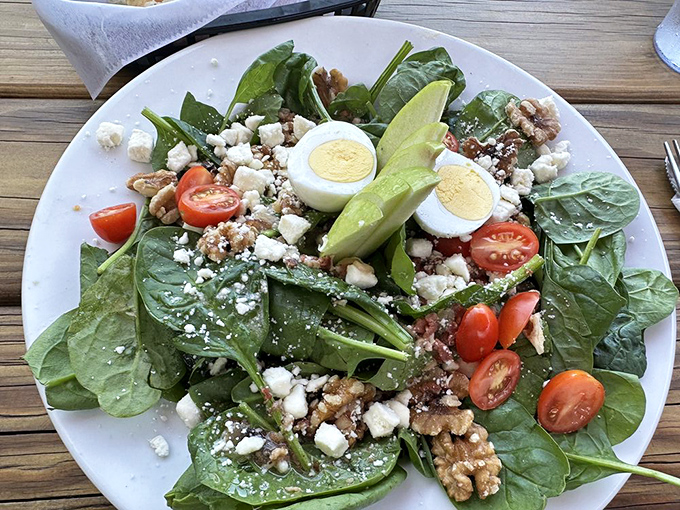 Even the salads here mean business. Fresh spinach, feta, walnuts, and eggs create a garden of delights for those pretending to be virtuous. 