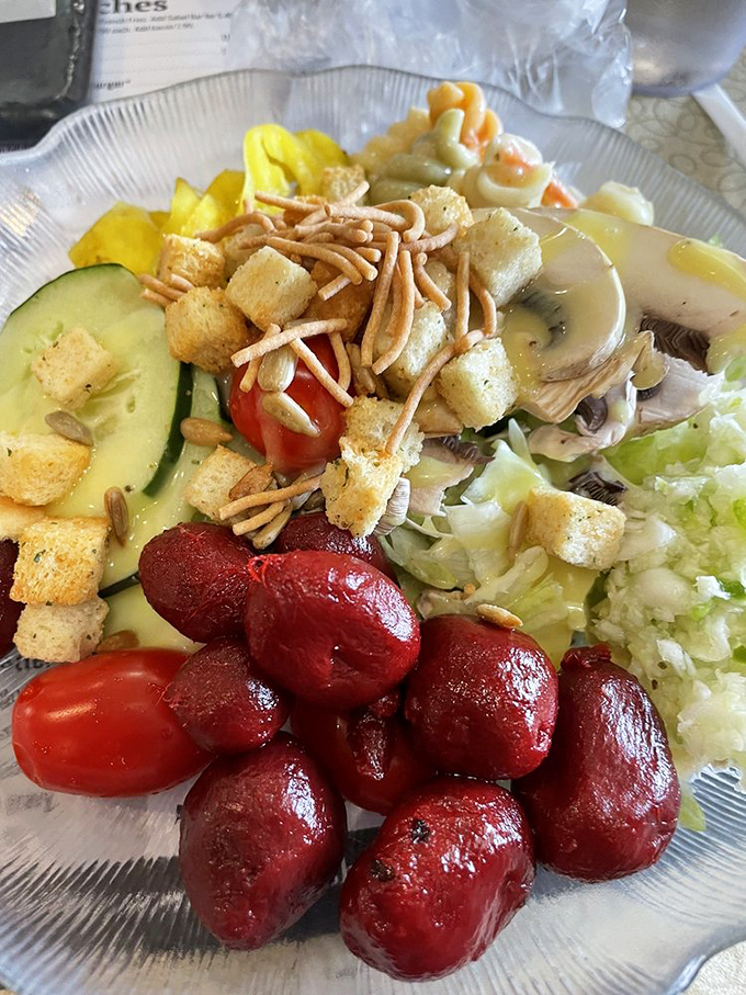 A salad that doesn't apologize for being healthy—it's dressed up with croutons, cheese, and those pickled beets that somehow taste like childhood.