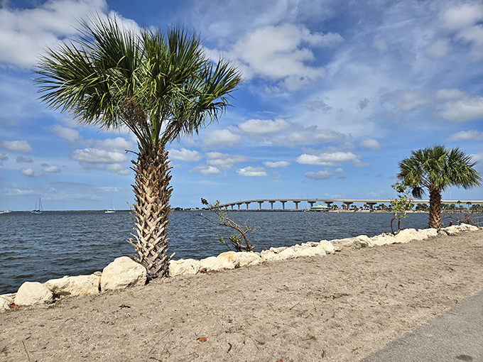 Sand Point Park's waterfront views come with a side of serenity and the occasional rocket launch. Try finding that combo at Disney.