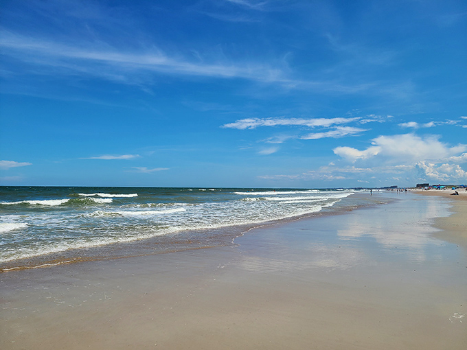 The Atlantic unfurls its blue carpet to the horizon, where waves perform their endless dance on shores that haven't changed their rhythm in centuries. 