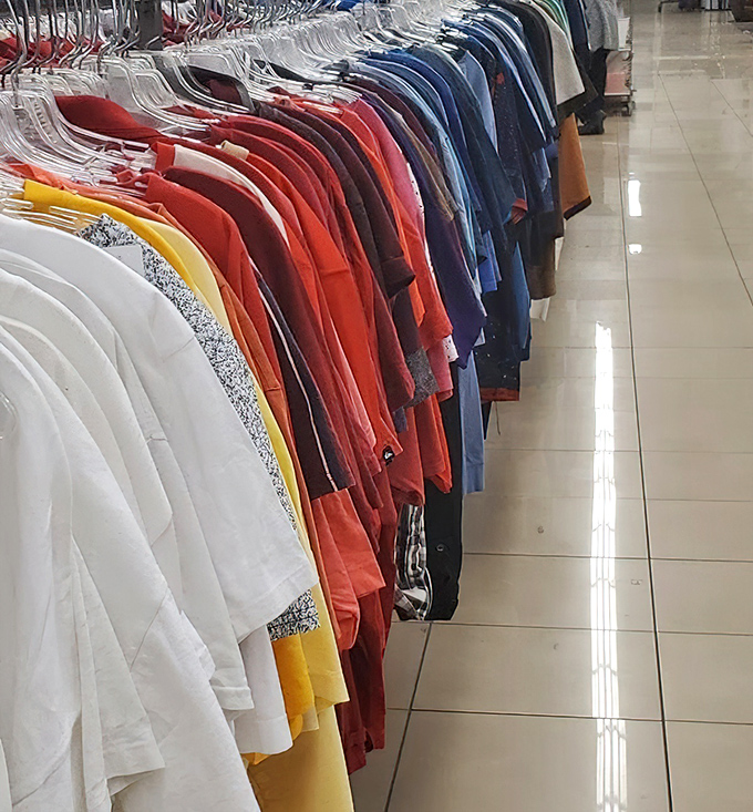 Color-coded clothing racks that would make Marie Kondo proud. Each shirt represents a possibility&mdash;and at these prices, why choose just one?