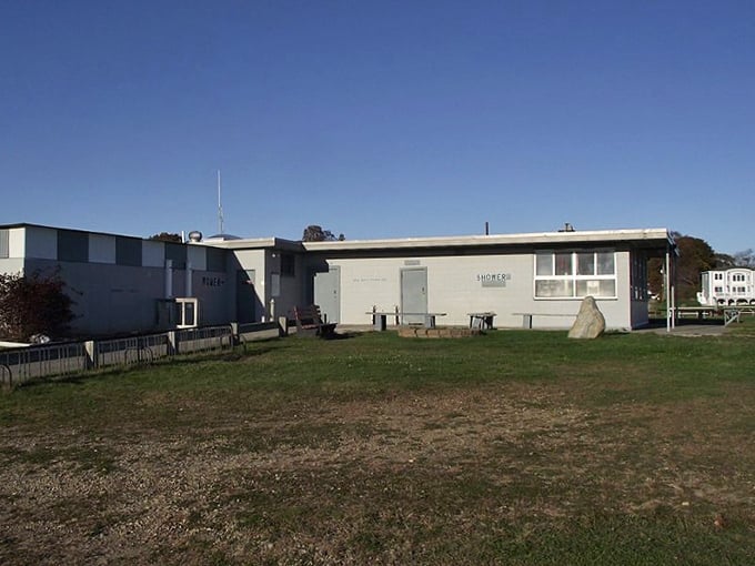 Beach infrastructure at its most utilitarian. Not glamorous, perhaps, but these humble buildings have witnessed countless sandy transformations over decades.