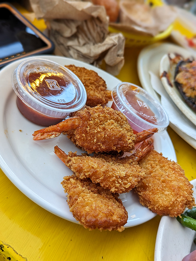Golden-fried shrimp with the perfect crunch-to-juiciness ratio &ndash; like edible exclamation points on a plate of pure satisfaction.