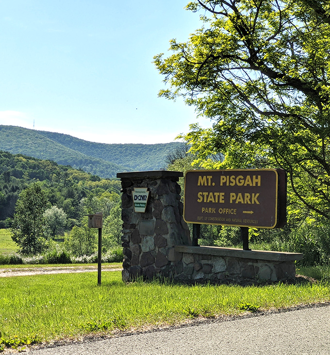 The entrance sign that promises adventure without overselling it&mdash;like a humble friend who casually mentions they have a yacht.