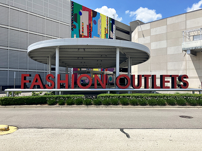 The circular entrance sign announces your arrival at the promised land. Fashion pilgrims, you have reached your destination.