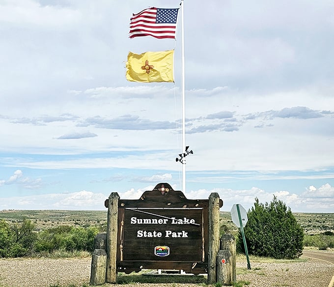 The official welcome sign that promises exactly what it delivers: peace, water, and nobody bothering you unnecessarily.