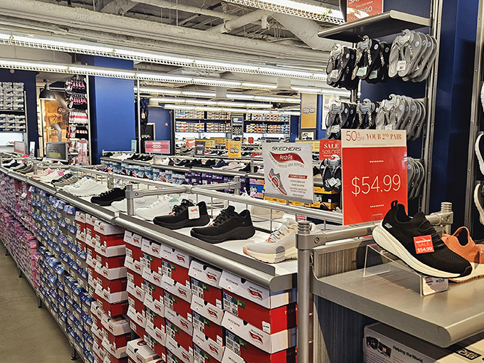 Shoe heaven awaits at this footwear emporium. Those red sale signs are the retail equivalent of a siren song—irresistible to the bargain-hunting shopper.