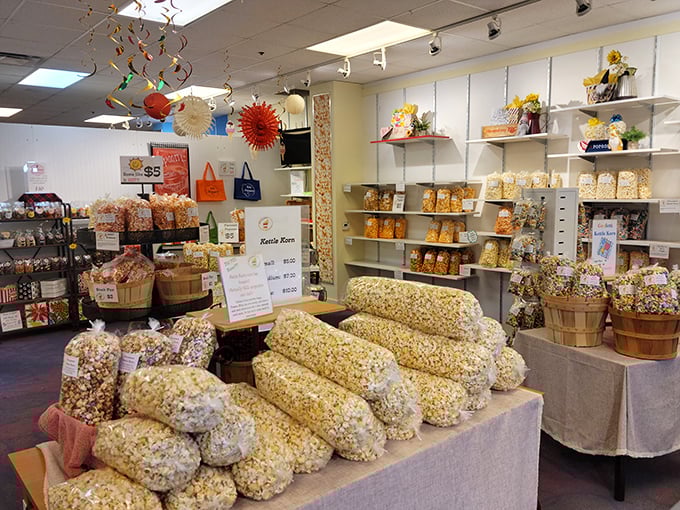 Popcorn paradise! These golden mountains of kettle corn stand ready to fuel serious shoppers through marathon bargain expeditions.