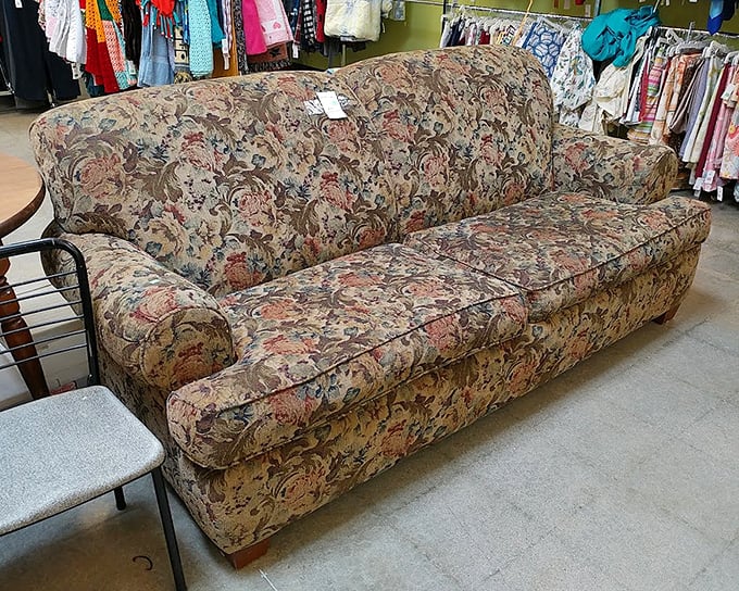 The quintessential '90s floral sofa &ndash; surprisingly comfortable and guaranteed to spark conversations about whether patterns really do come back in style.