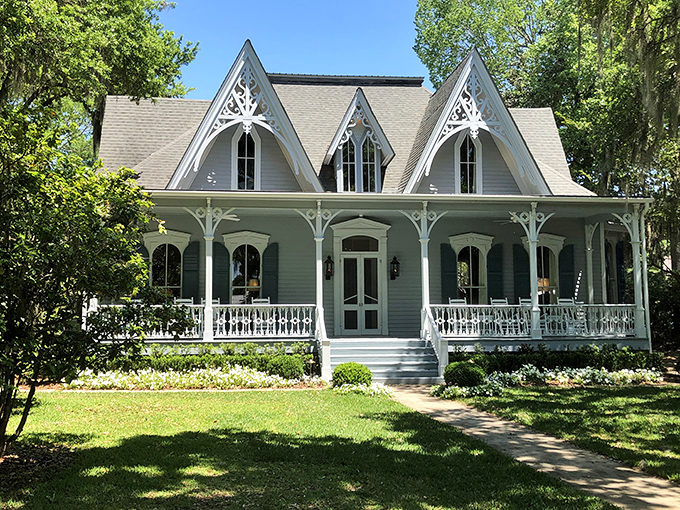 Gothic Revival details make this historic home a photographer's dream. The intricate "gingerbread" trim transforms practical architecture into edible-looking art.