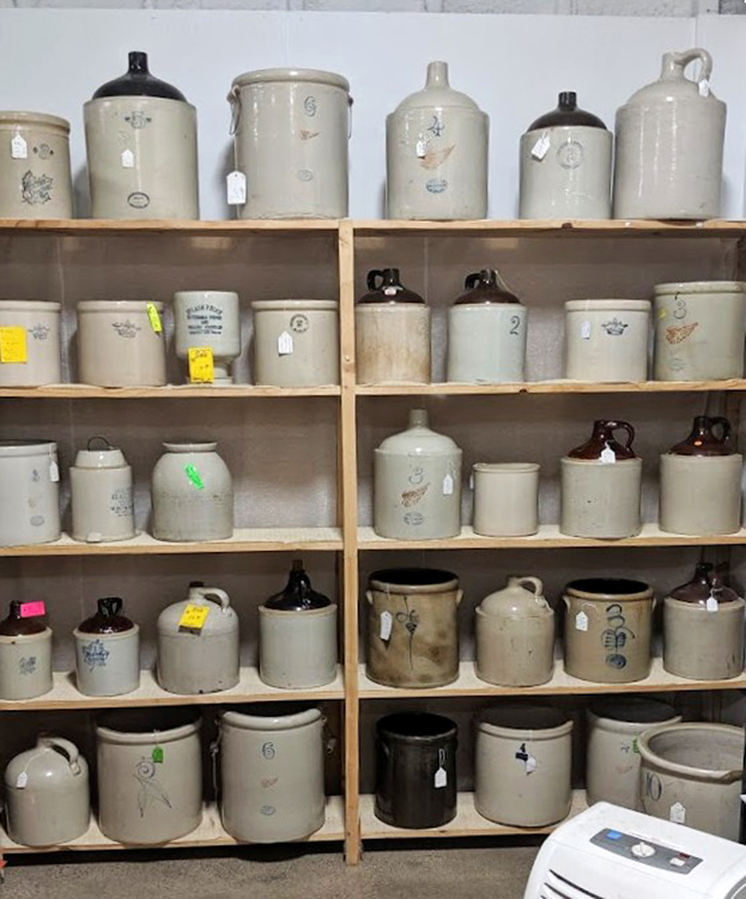 Stoneware jugs standing at attention like ceramic soldiers. These sturdy vessels once held everything from whiskey to maple syrup to grandma's secret pickle brine.