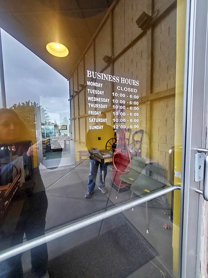 Even the business hours sign feels nostalgic. Tuesday through Sunday, this time machine awaits your arrival.