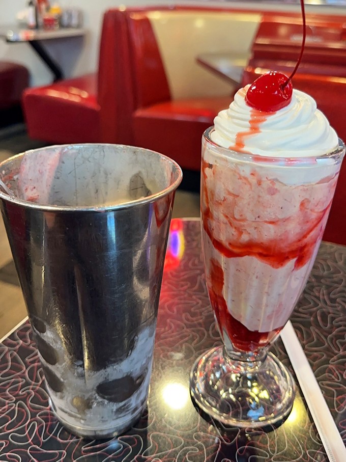 This strawberry milkshake isn't just a drink&mdash;it's dessert with a straw. The metal mixing cup on the side means you're getting every last drop of that creamy goodness.