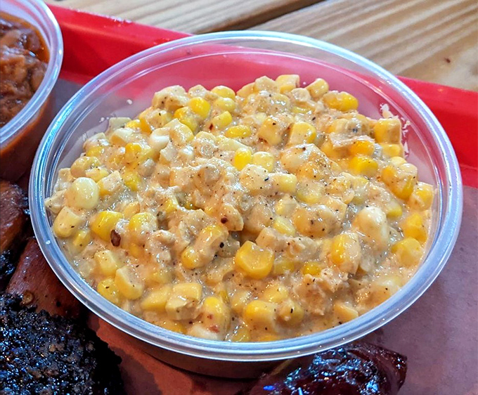 Creamy street corn studded with kernels of gold&mdash;the perfect sidekick to the smoky main characters on your tray.