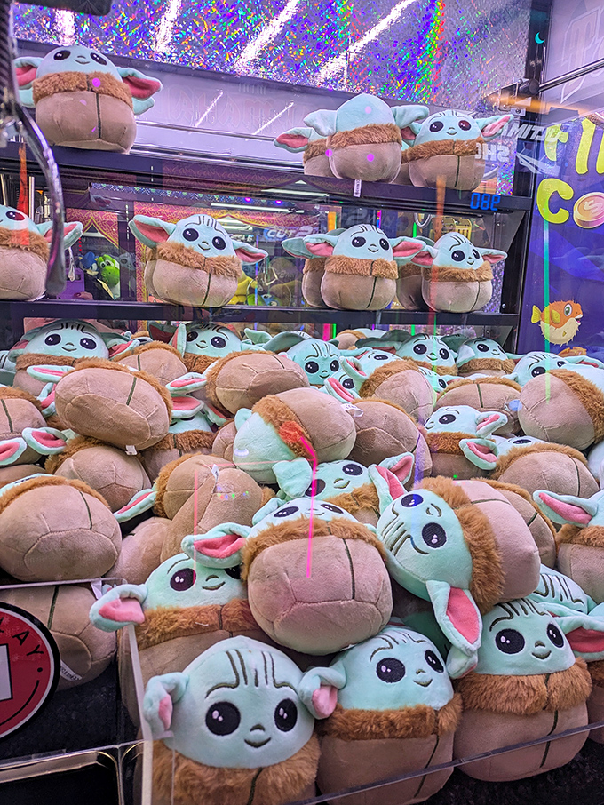 Baby Yoda army awaits adoption! These adorable plush creatures from The Mandalorian prove cuteness is the ultimate retail strategy.