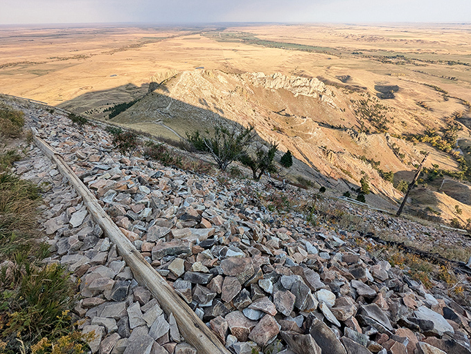 The rocky trail hugs the butte's contours, revealing vistas that make you feel like you've stumbled onto the set of a Western epic.